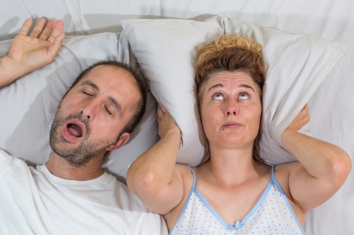 How to Deal with a Snoring Spouse: 7 Tips for Better Sleep